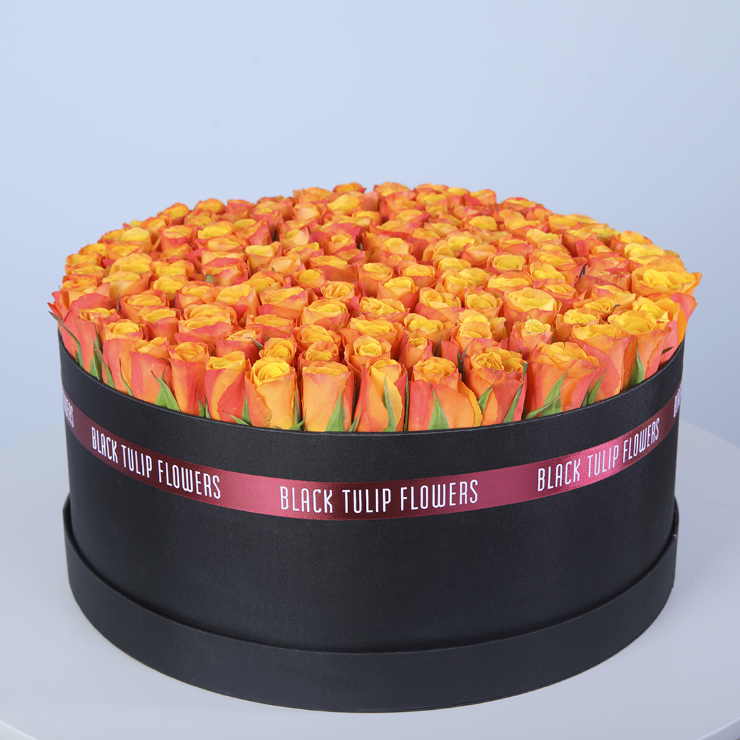 Radiant Orange Roses | 100 Roses in a Black Hat Box